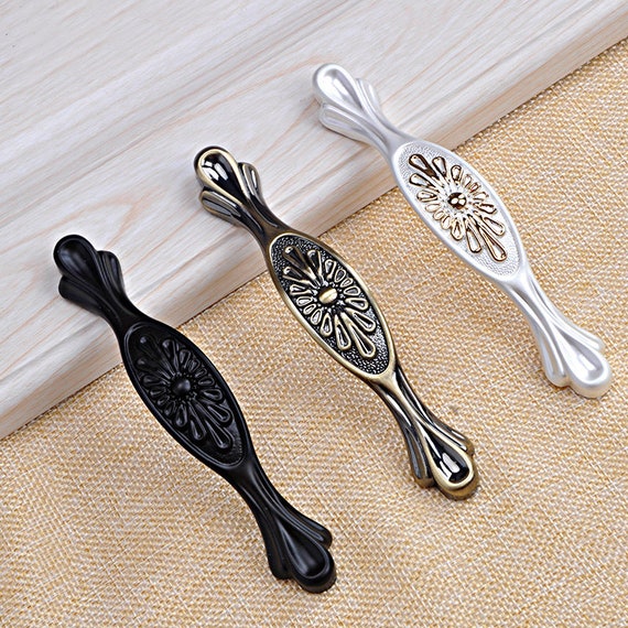 Update your cabinets with decorative drawer pulls in various sizes and ...