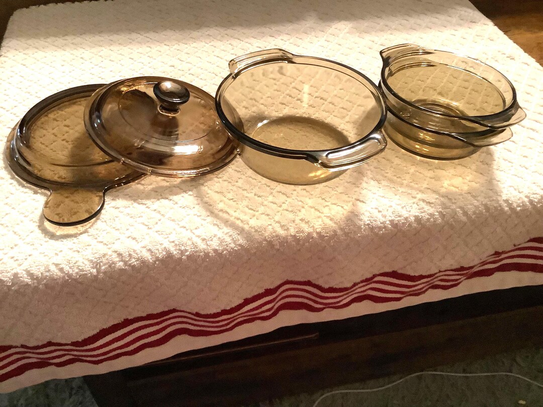2 Pyrex Lids and 3 Unmarked Bowls 1 Pyrex Lid is P81C and the Other One ...