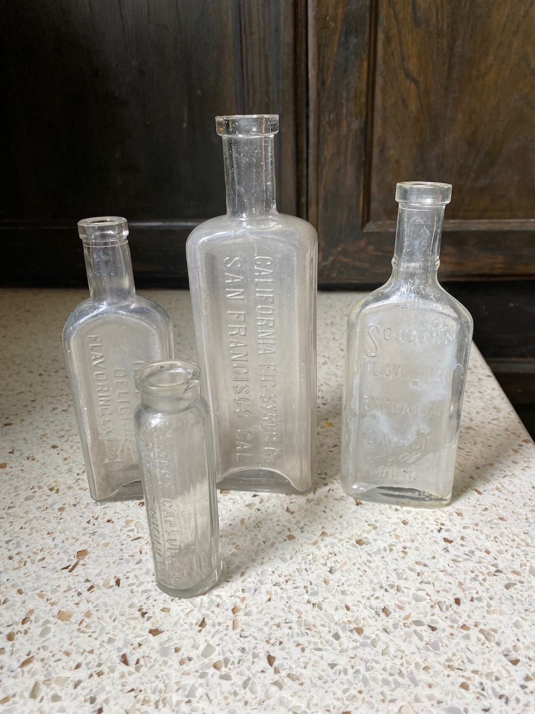 4 Embossed Bottles. Distressed Clear Bottles. 3 Cooking, 1 Medicine Vintage Bottle Collection ...