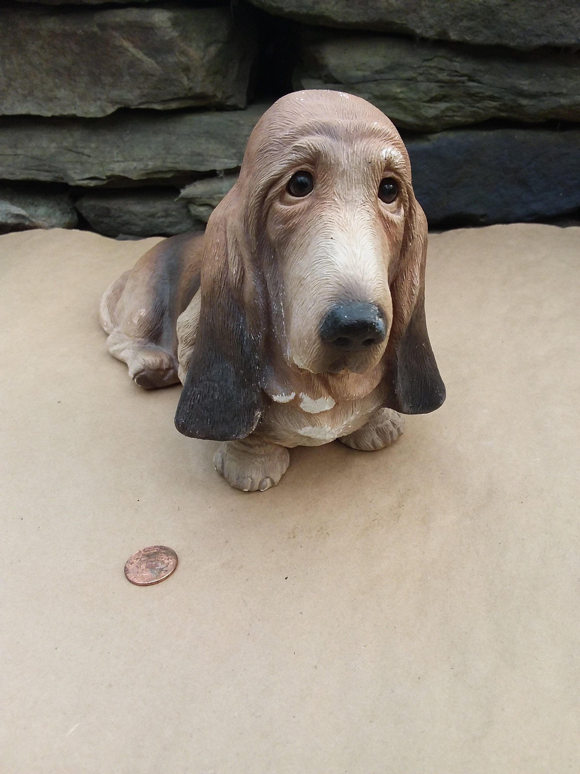 People Hugging Basset Hound