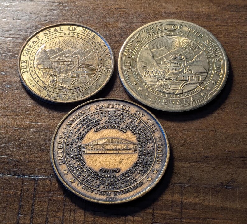 Nevada State Seal 36th State From Hoist to Highrise + Los Vegas Dollar ...