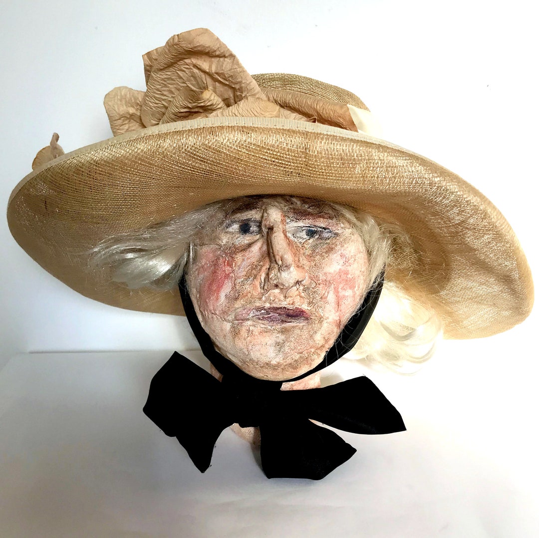 Uncanny Art Soft Sculpture Head of a Woman Wearing a Large Hat. A ...