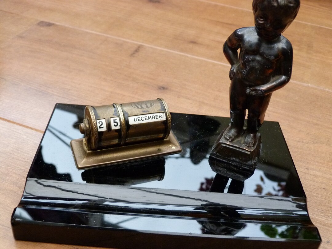 Vintage Brass Perpetual Calendar With Brussels Boy Figurine on Black ...