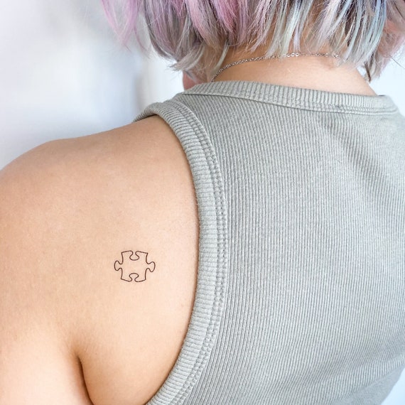 Jigsaw Puzzle Piece Tattoo Designs