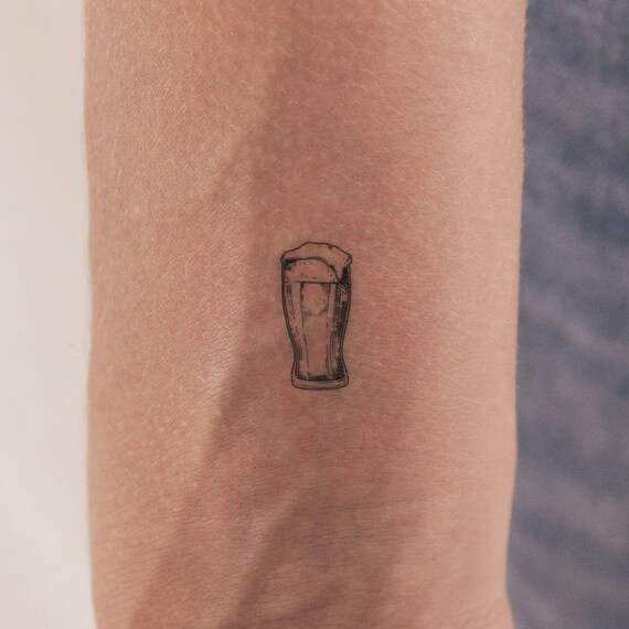 Beer Pint Tattoos Beer Bottle Tattoo Flash By Vikingtattoo On