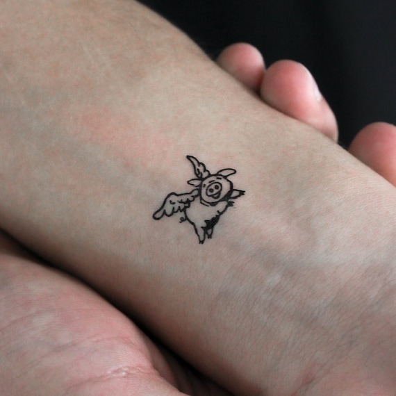 Flying Pig Tattoo Design