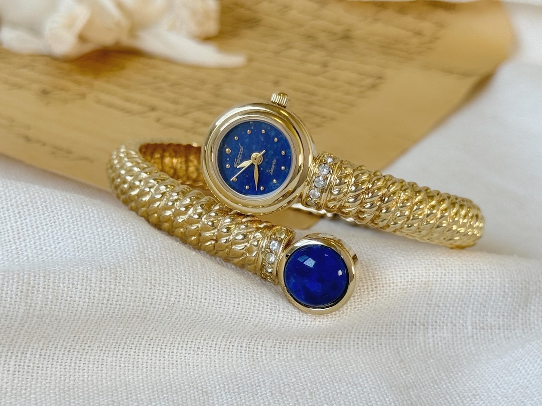 Vintage Vexcel Gold Tone Bangle Watch With Blue Stone - Etsy