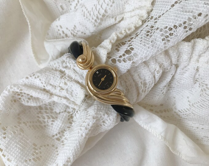 Vintage AVON Black Plastic and Gold Tone Metal Women Cuff Bangle Watch ...