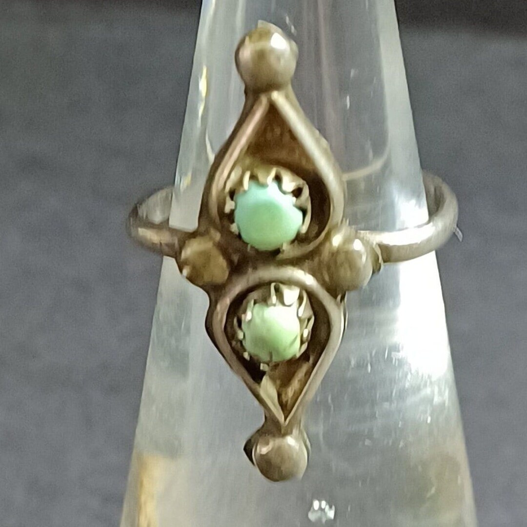 A Small Native American Ring With a Zuni Style Snake Eye Turquoise ...