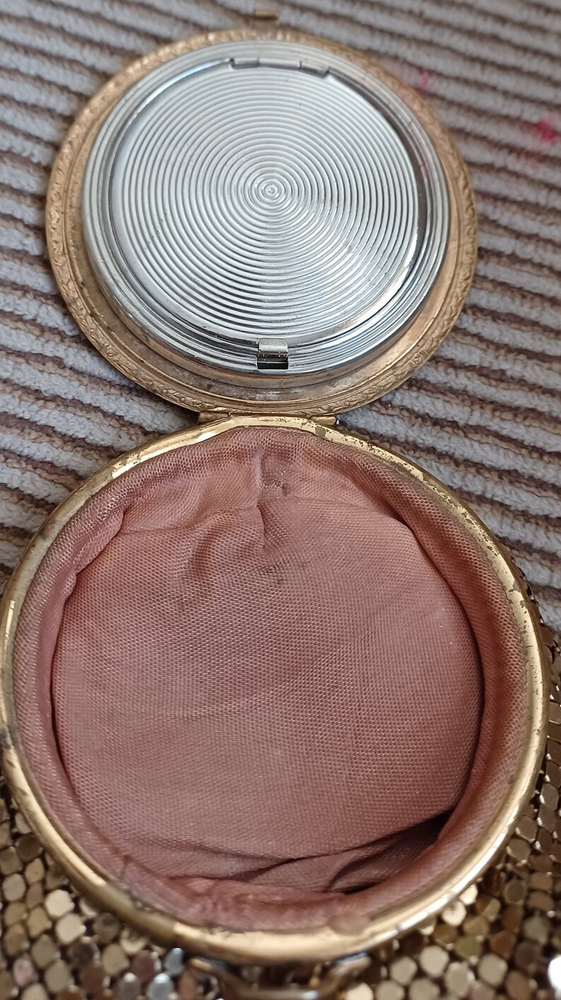 A Vintage Black Enamel Compact With Several Compartments Under Lid ...