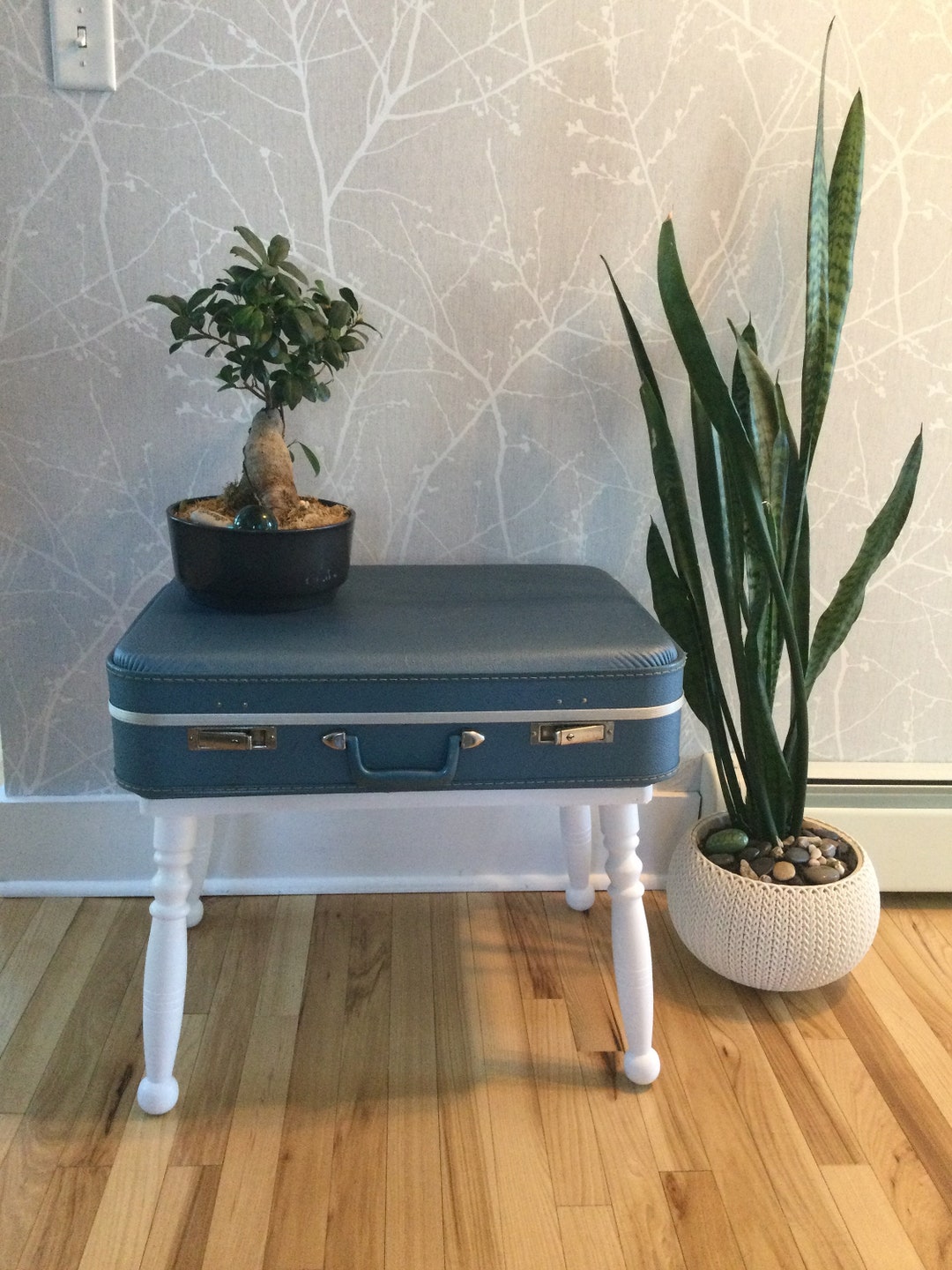 Suitcase bedside table store
