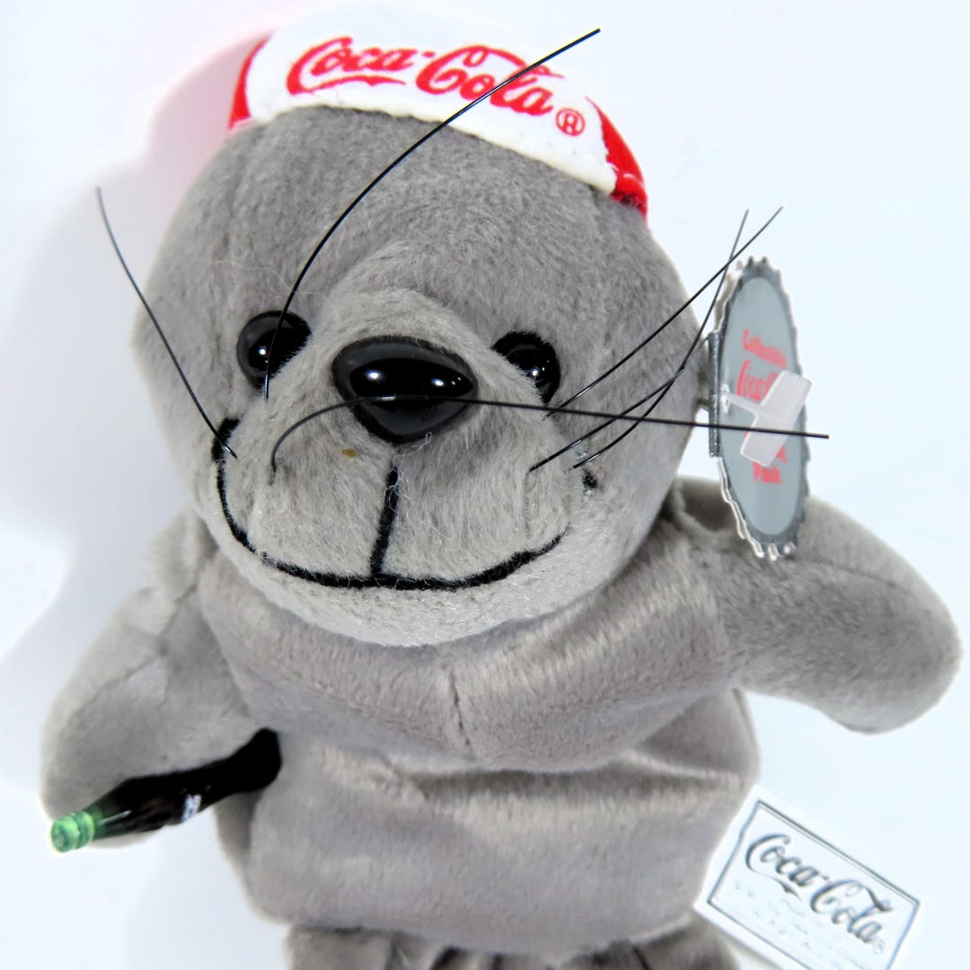 New Coca Cola Seal With Tags, Adorable Seal Pup in Baseball Cap Holding ...