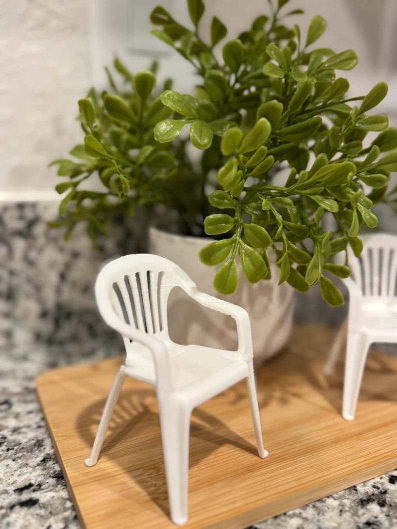 DTMF 1 Keychain of the Classic White Monobloque Chair Bad Bunny Album ...