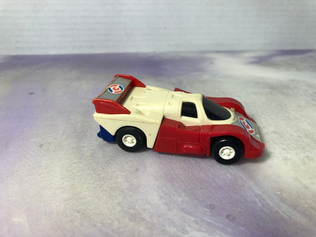 TOMY COMMANDRONS Action Figure MOTRON Race Car Super Alternators 1985 ...