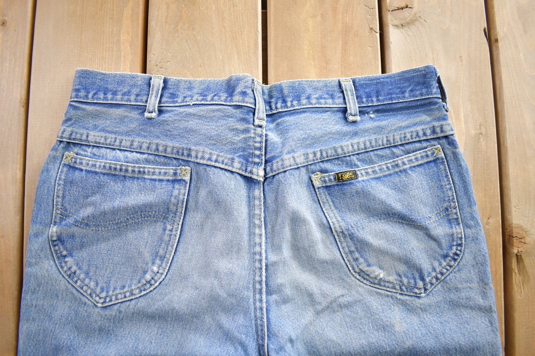 Vintage 1980s Distressed Lee Denim Jeans Made in USA Size Vintage 1980s Distressed Lee Denim Jeans Made in USA Size