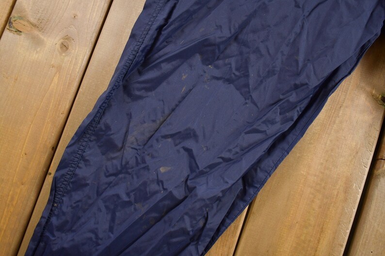 Vintage 1990s Nike Mini Swoosh Track Pants Size XL / Stripe / Nike ...