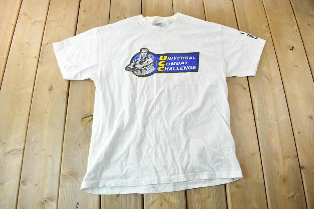 Vintage 1990s Universal Combat Challenge Graphic T-shirt / UCC / Show ...