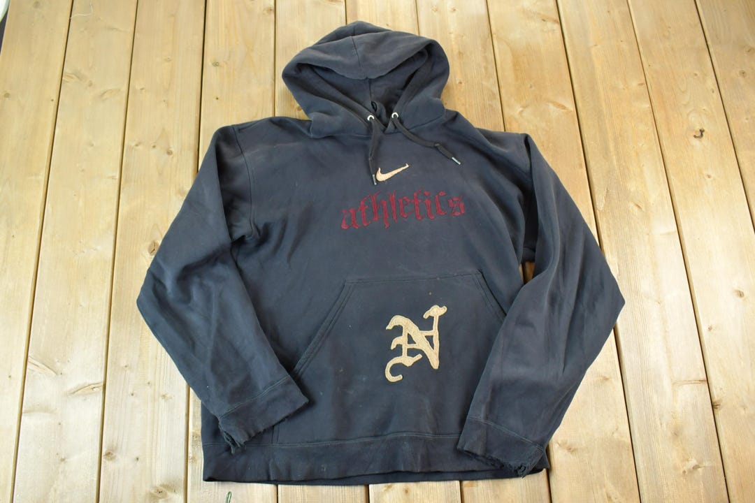 Vintage 1990s Nike Athletics Embroidered Gothic Swoosh Hoodie ...