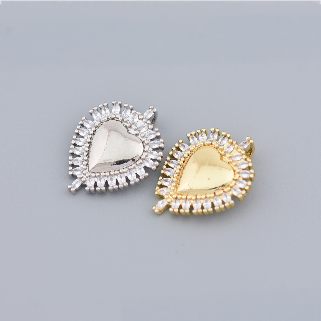 Regal Gold Heart Charm Surrounded by Leaf-shaped Crystals, Featuring A ...