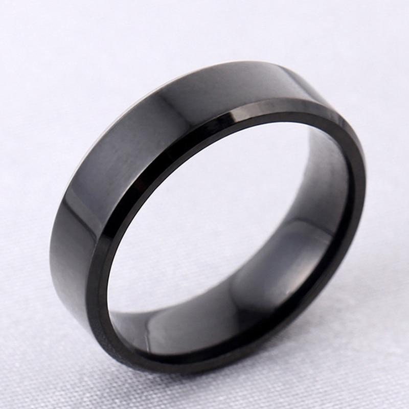 Anillo negro de acero inoxidable para hombres y mujeres - Etsy España