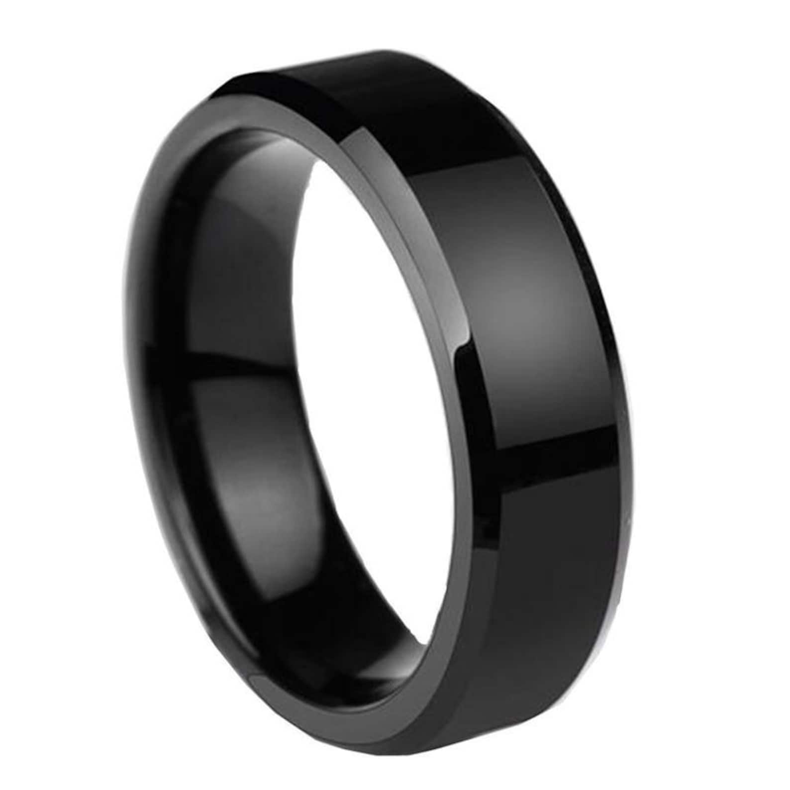 Anillo negro de acero inoxidable para hombres y mujeres - Etsy España