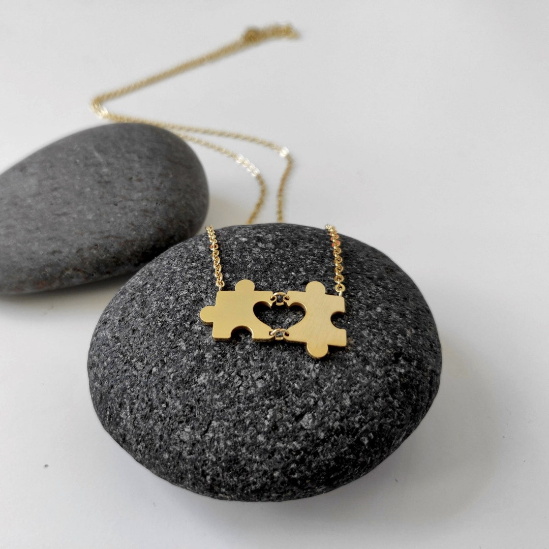 Collier puzzle | puzzle de deux ors avec un coeur | délicatesse ...