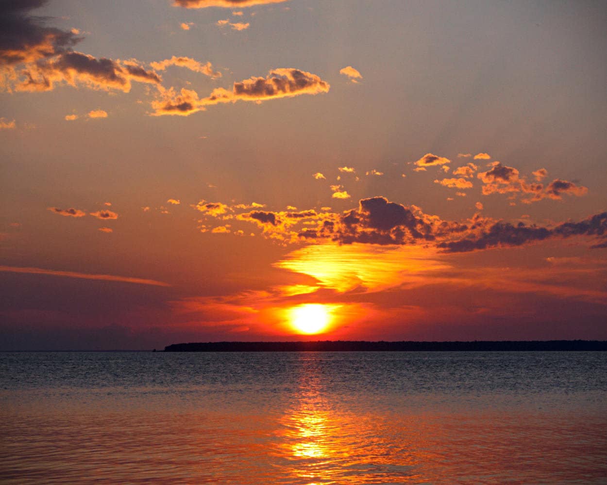 Photograph of Vibrant Sunset Over Green Bay in Door County Wisconsin ...