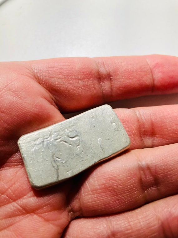 1 Oz Silver Bar In Hand