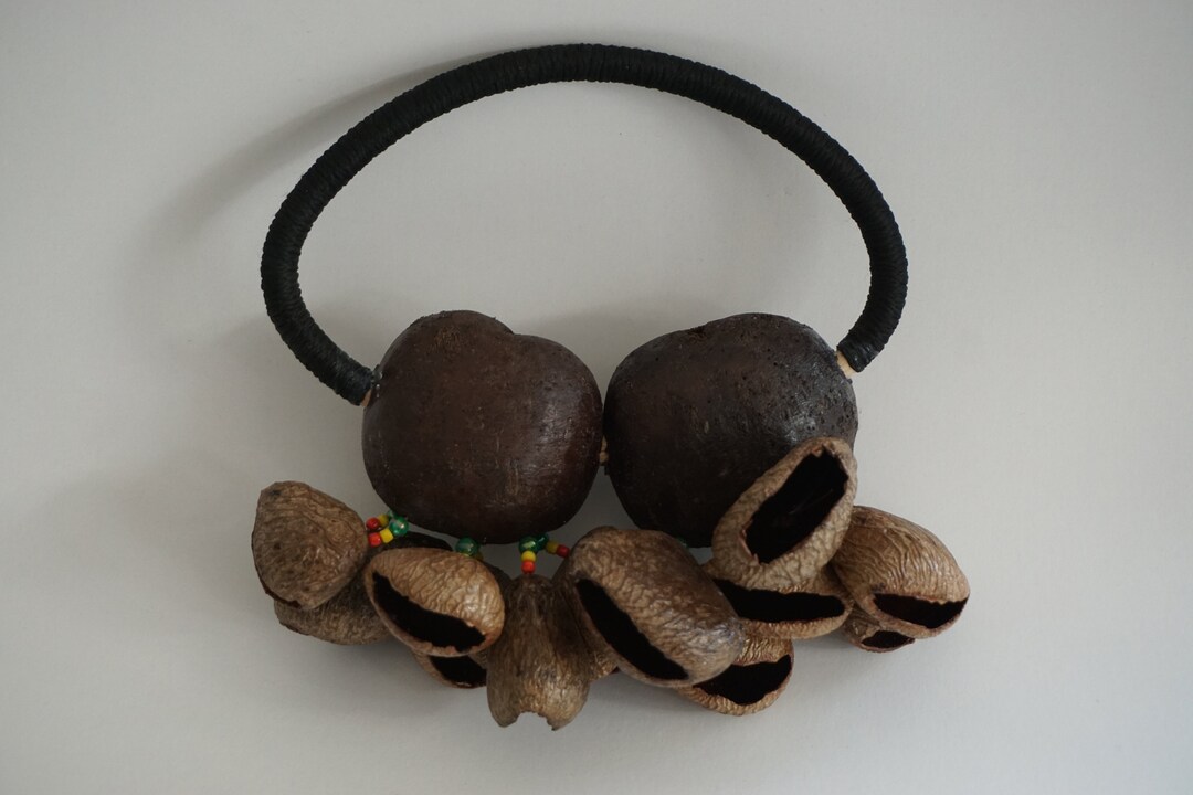 A Hand-held Shaker Made of Tree Nut Shells - Handicraft - Etsy