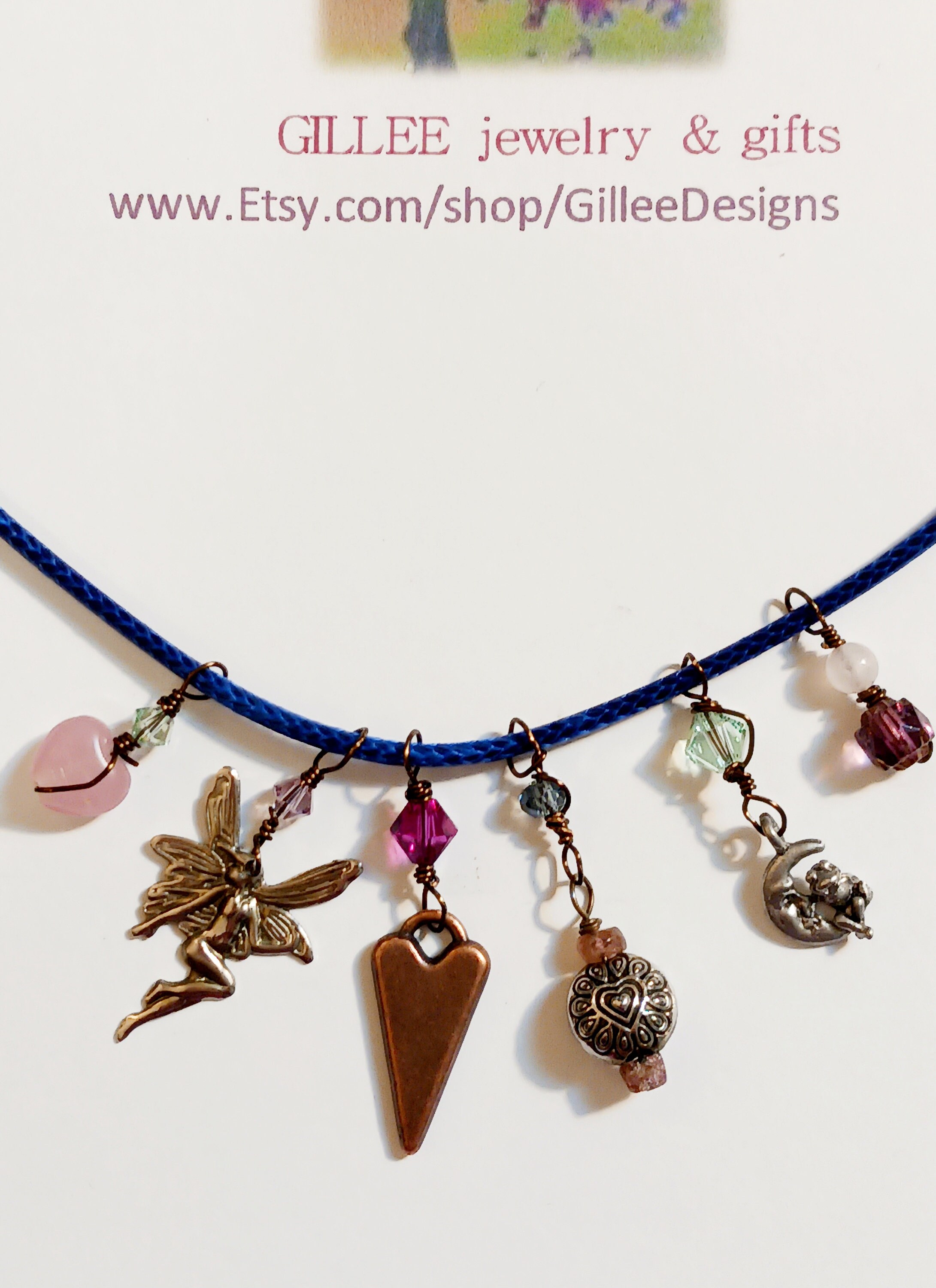 Whimsical Fun Dangling Charms on Royal Blue Cotton Cord Necklace ...