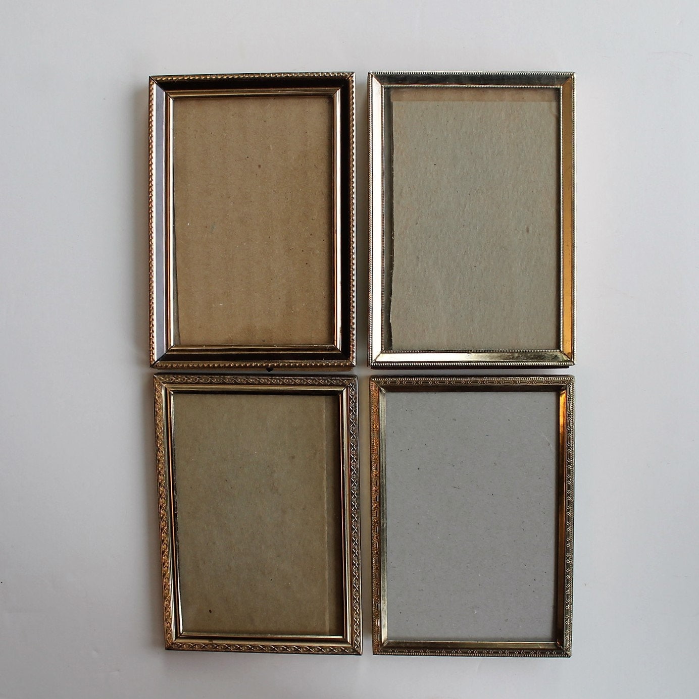 Vintage 3x5 Metal Gold Brass Colored Photo Picture Frame Set Of 4 vintage-3x5-metal-gold-brass-colored-photo-picture-frame-set-of-4