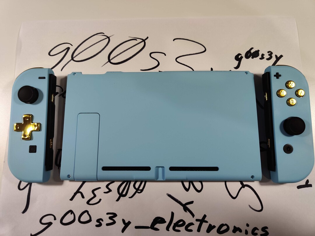 New Nintendo Switch Custom Light Blue DPAD Joycons With Gold Buttons ...