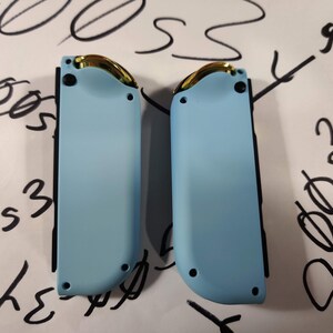 New Nintendo Switch Custom Light Blue DPAD Joycons With Gold Buttons ...