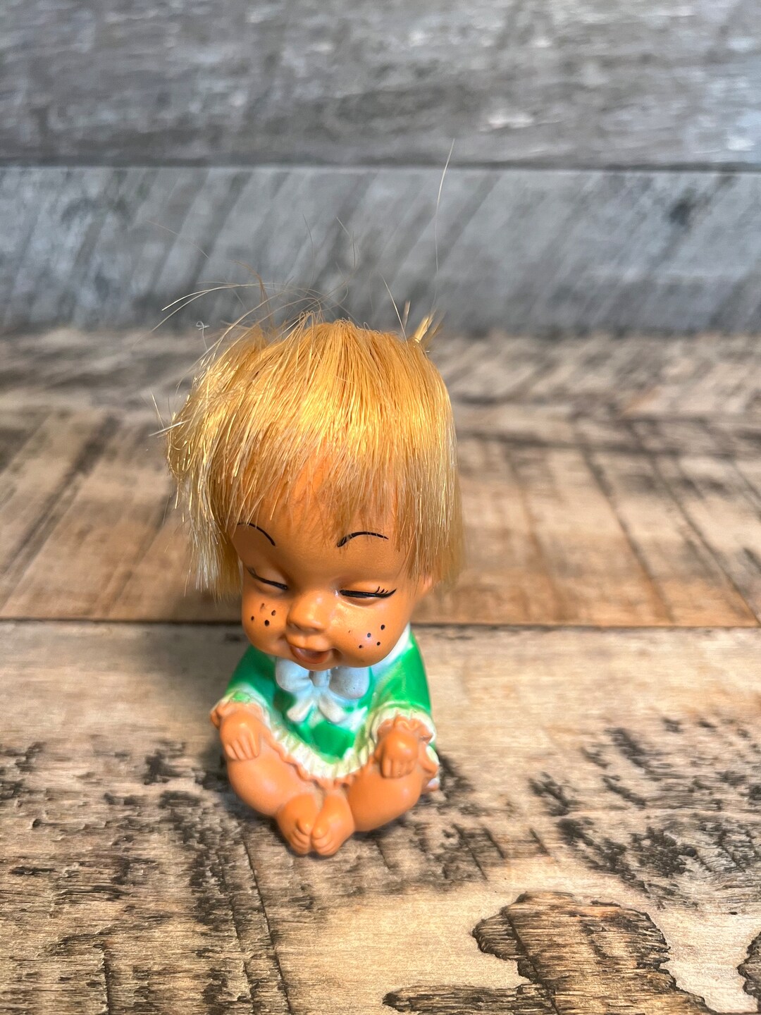 1960s Moody Cutie Doll Laughing Face Blond Hair Green Dress Made in ...