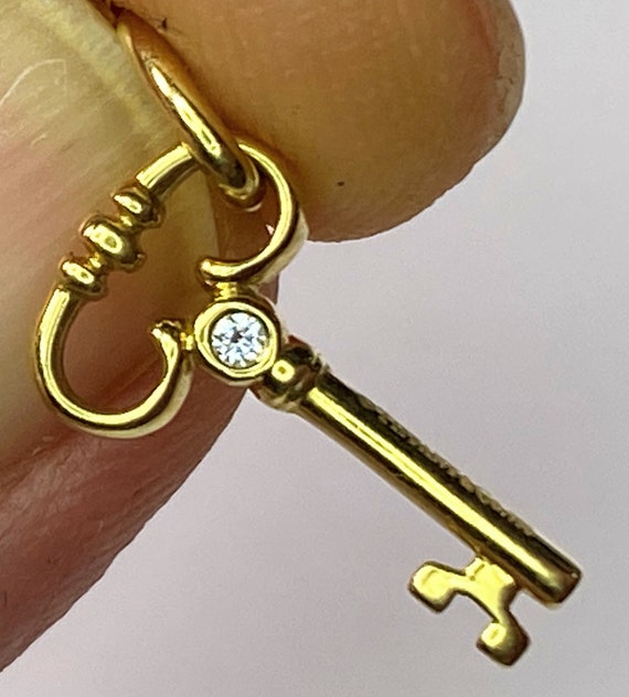Tiffany & Co. 18K yellow gold Diamond KEY pendant cur… - Gem