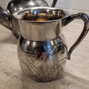 The Acme Silver Plate Company of Boston Tea Set, Teapot, Creamer, and ...