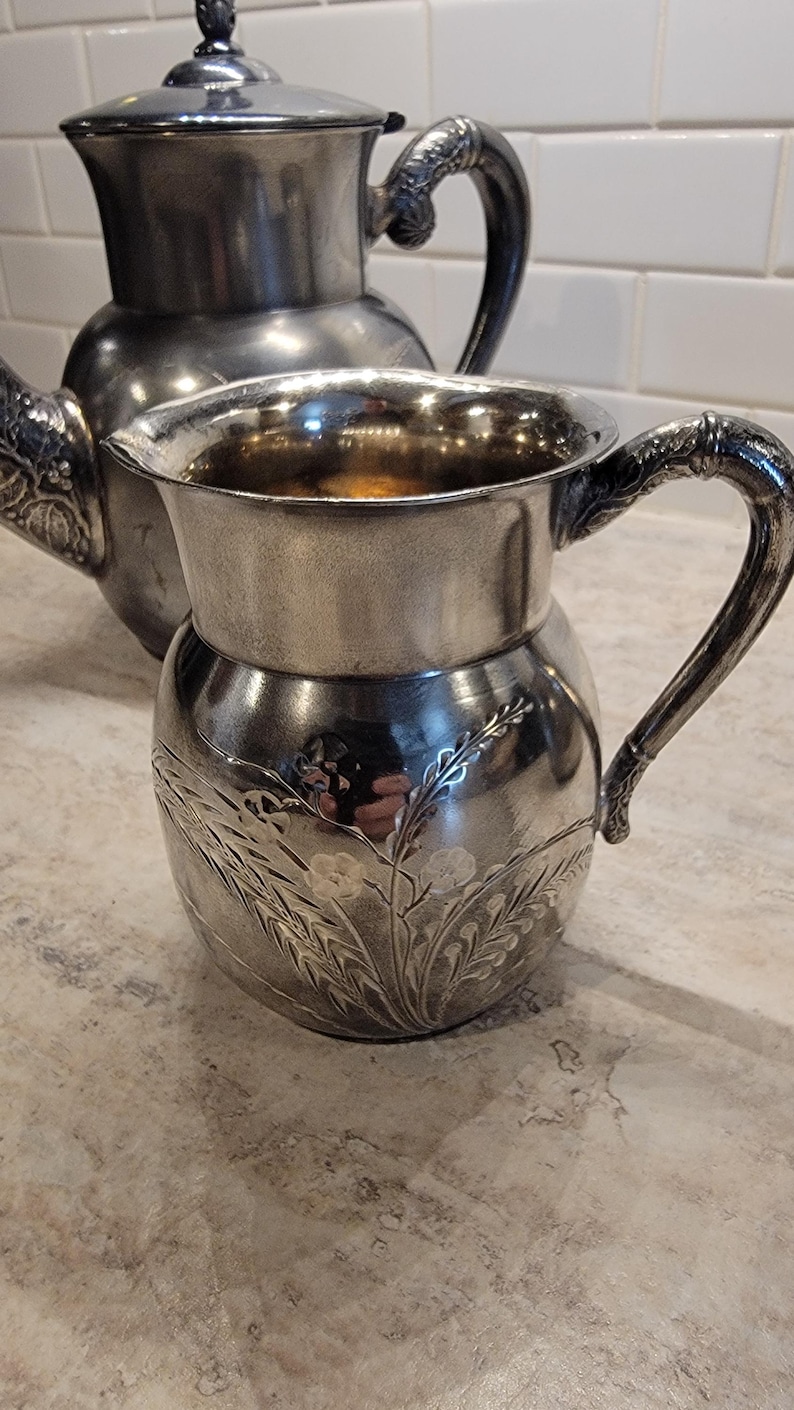 The Acme Silver Plate Company of Boston Tea Set, Teapot, Creamer, and ...