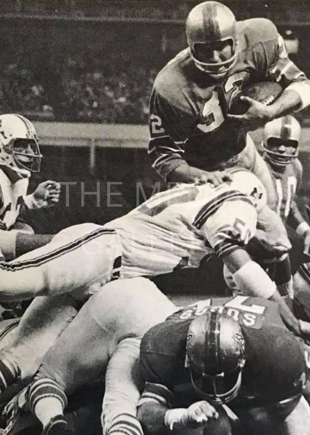 Hoyle Granger Leaps Over Players Photo Print - American Football ...