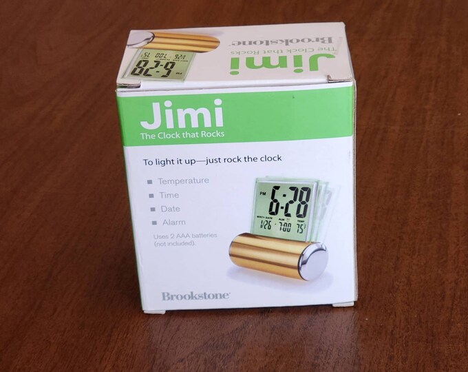 Brookstone Jimi the Clock That Rocks Lighted Motion Alarm Temperature ...