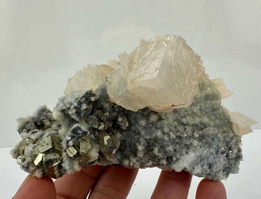 Fluorescent Benz Mangano Calcite on Quartz With Pyrite - Krushev Dol ...