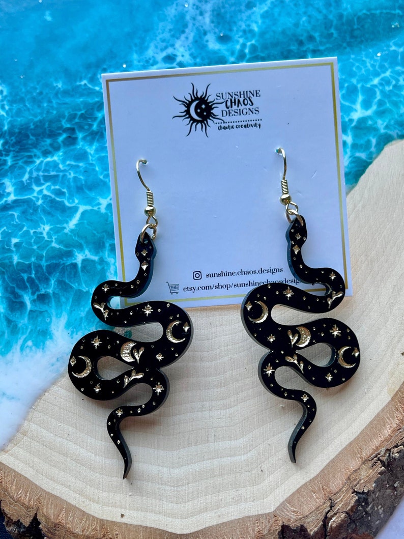 Black Acrylic Celestial Snake Earrings with Gold engravings | Etsy