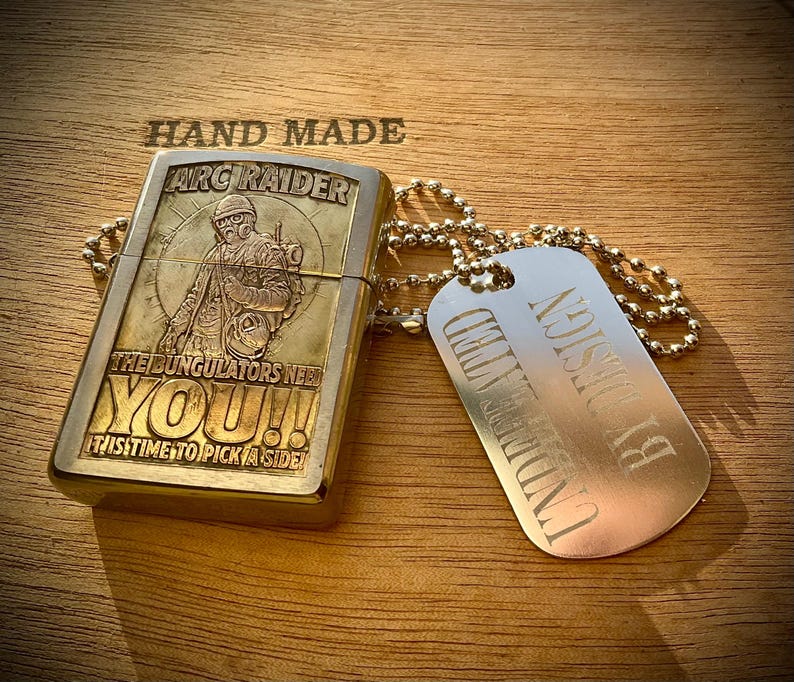 One-of-a-kind ARC Raiders Zippo – Deep Engraved Brass Armor Case ...