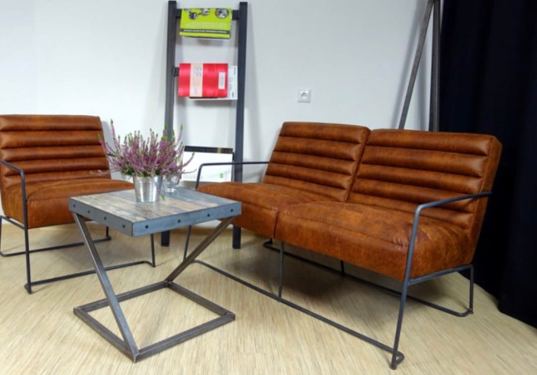 Leather sofa with metal legs store