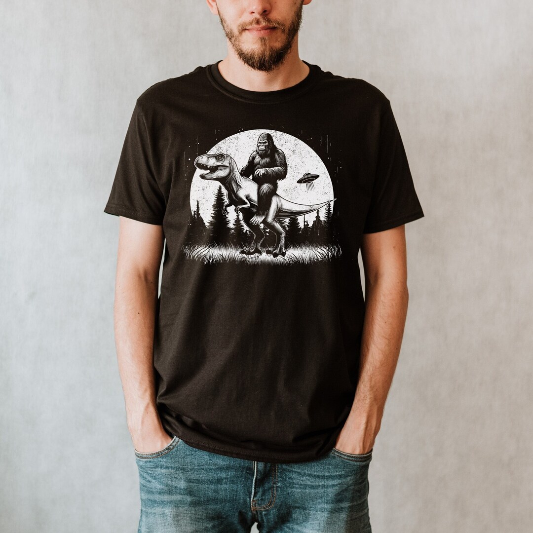 Bigfoot Shirt, Bigfoot Riding Dinosaur Shirt, Bigfoot UFO Shirt, Funny ...