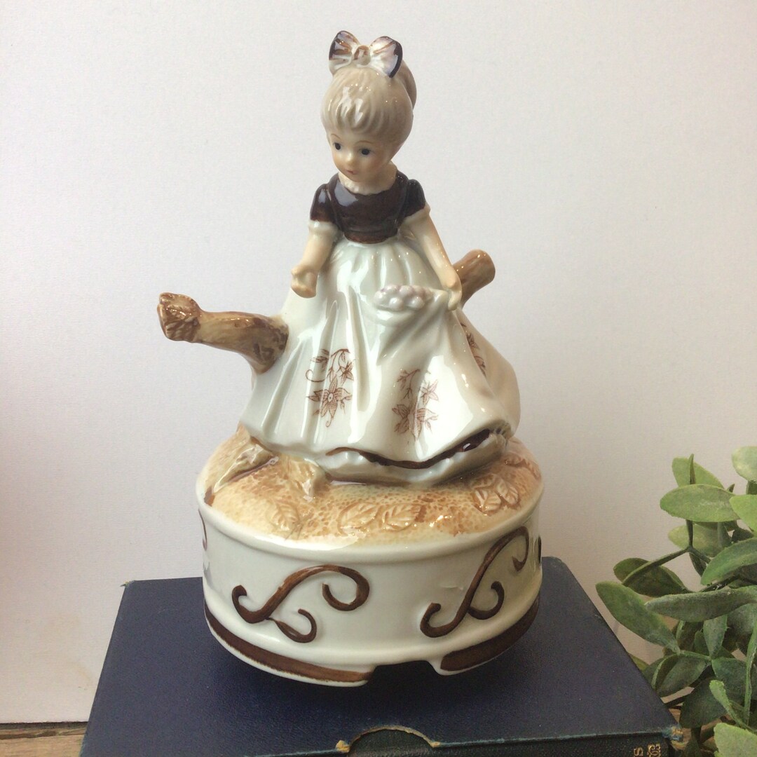 Vintage Spinning Music Box Figurine, Young Girl Collecting Eggs in ...