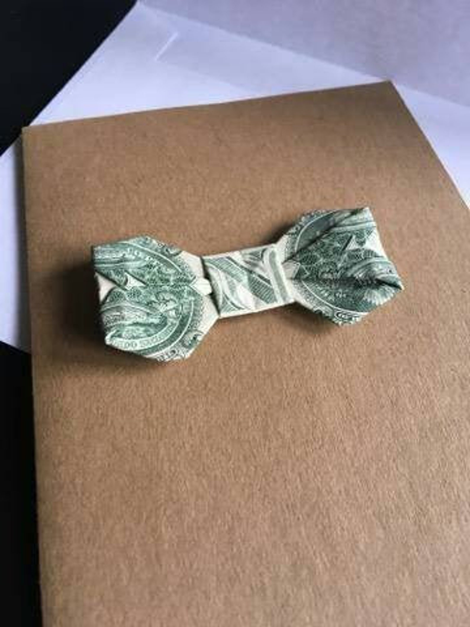 Dollar Bill Origami Bow A Step By Step Tutorial Easy Origami Tutorial