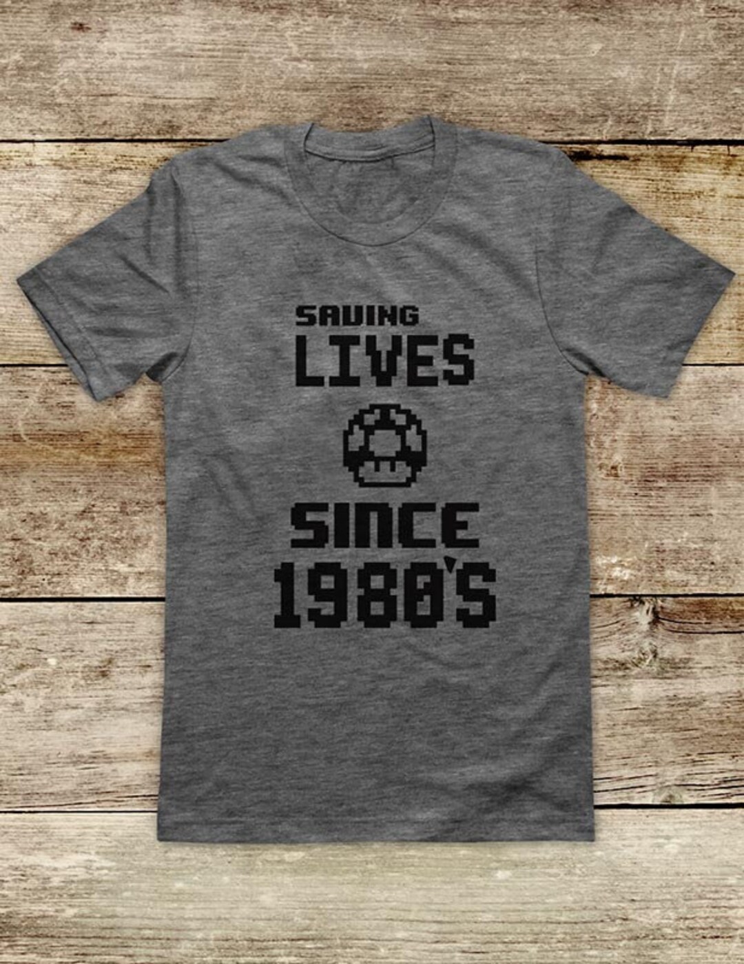 Saving Lives Since the 1980s Funny Vintage Retro Video Game Design ...