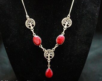 Items similar to Red passion cristal and root ruby tree of life pendant ...