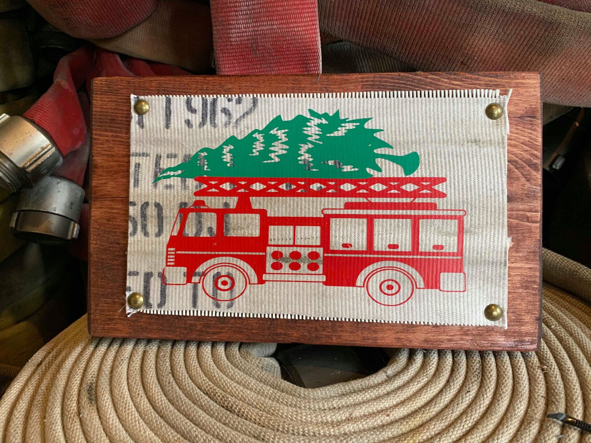 Fire Hose Sign with a fire truck & Christmas tree for | Etsy