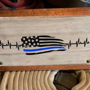 Fire Hose Sign With the Thin Blue Line Flag for Law Enforcement. Great ...